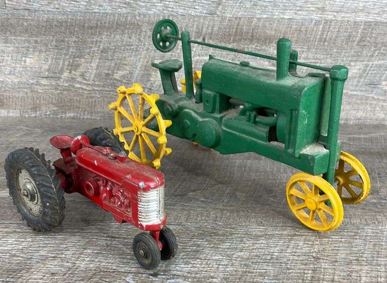 John Deere cast iron & Farmall metal tractors - Schneider Auctioneers LLC