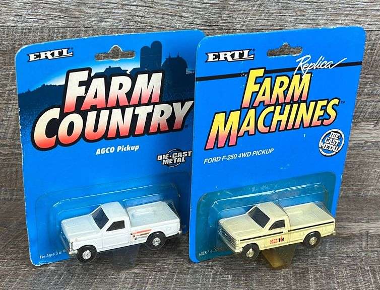 Pair of 1/64 Ertl Ford F-250 pickups - Schneider Auctioneers LLC