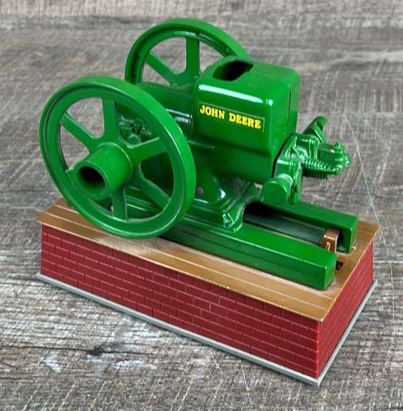 Ertl John Deere battery powered engine - Schneider Auctioneers LLC