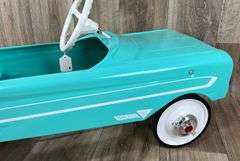 1960s AMF Jet Sweep restored pedal car - Schneider Auctioneers LLC