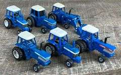 Group of 1/64 Ford tractors - Schneider Auctioneers LLC