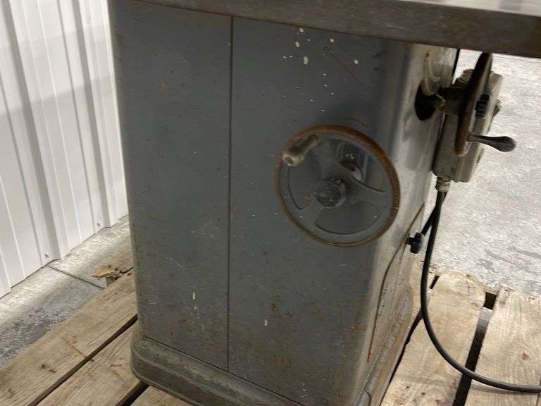 Delta Unisaw 10" table saw - Schneider Auctioneers LLC