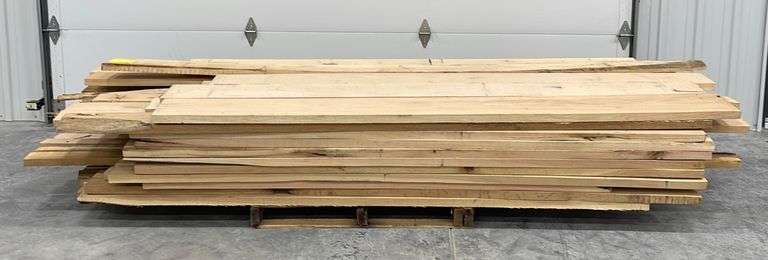 Group of rough cut oak lumber up to 10.5' long - Schneider Auctioneers LLC
