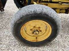 Ford 3400 industrial diesel tractor w/ loader - Schneider Auctioneers LLC