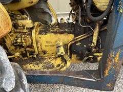 Ford 3400 industrial diesel tractor w/ loader - Schneider Auctioneers LLC