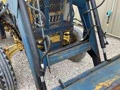 Ford 3400 industrial diesel tractor w/ loader - Schneider Auctioneers LLC