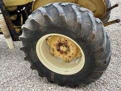 Ford 3400 industrial diesel tractor w/ loader - Schneider Auctioneers LLC