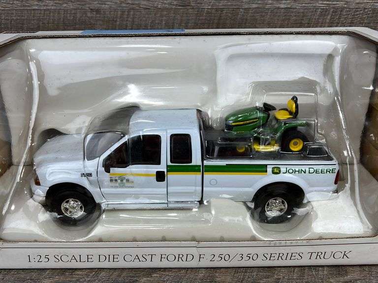 1/25 SpecCast John Deere Ford F-250 pickup w/X534 mower - Schneider ...