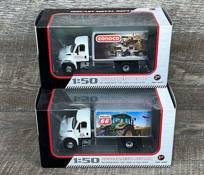 Pair of 1/50 First Gear Conoco/Phillips 66 International DuraStar trucks - Schneider Auctioneers LLC