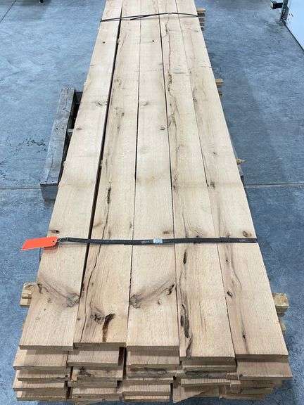 Group of 1"x6"x10.5' rough cut oak lumber - Schneider Auctioneers LLC