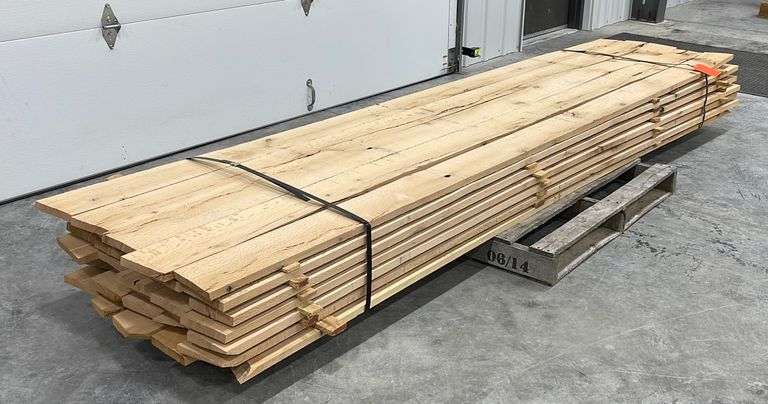 Group of 1"x6"x10.5' rough cut oak lumber - Schneider Auctioneers LLC