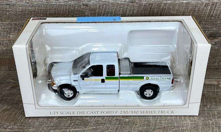 1/25 SpecCast John Deere Ford F-250 pickup - Schneider Auctioneers LLC