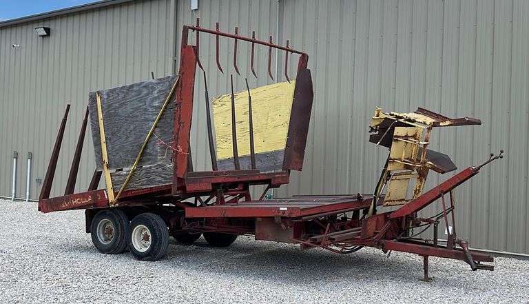 New Holland 1033 square bale stack wagon - Schneider Auctioneers LLC