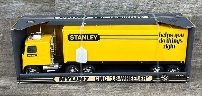 Nylint GMC Astro Stanley tractor trailer - Schneider Auctioneers LLC