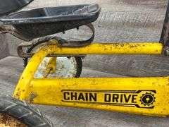 Vintage Western Flyer Chain Drive pedal tractor - Schneider Auctioneers LLC