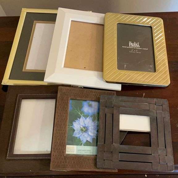 VHS tapes and picture frames - Sherwood Auctions