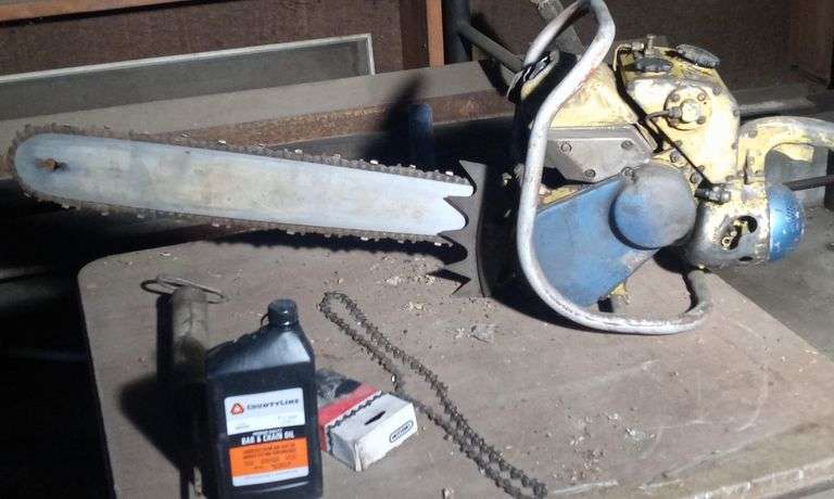 Clinton Vintage Chainsaw and Chainsaw Accessories - Sherwood Auctions