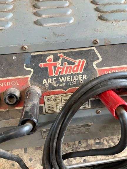 Trindl Arc Welder + rods - Sherwood Auctions
