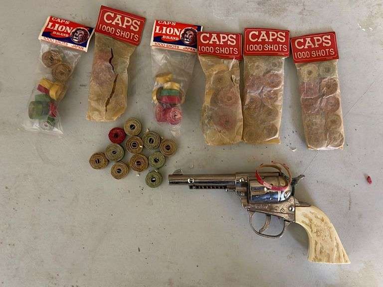 Daisy Cap Gun + Unopened Packages of Caps - Sherwood Auctions
