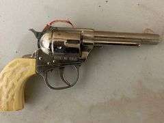 Daisy Cap Gun + Unopened Packages of Caps - Sherwood Auctions