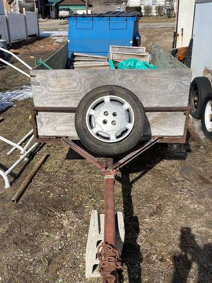Wooden Trailer w/ Spare Tire & wooden signs - Sherwood Auctions