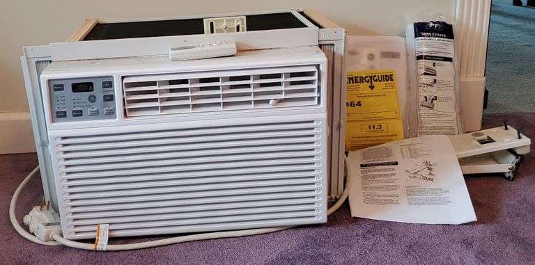 GE Window Air Conditioner Unit, with hardware - Sherwood Auctions