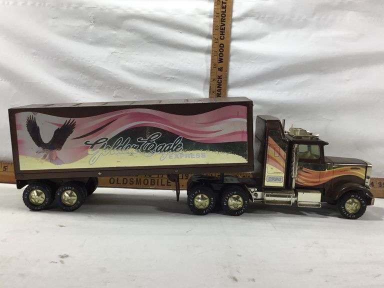 Freightliner Semi With Golden Eagle Express Trailer - Sherwood Auctions