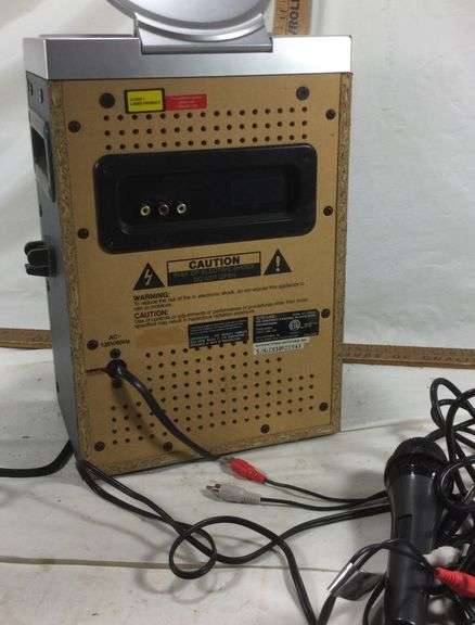 Craig Karaoke Machine, Mic and Discs! - Sherwood Auctions