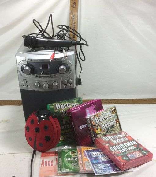 Craig Karaoke Machine, Mic and Discs! - Sherwood Auctions