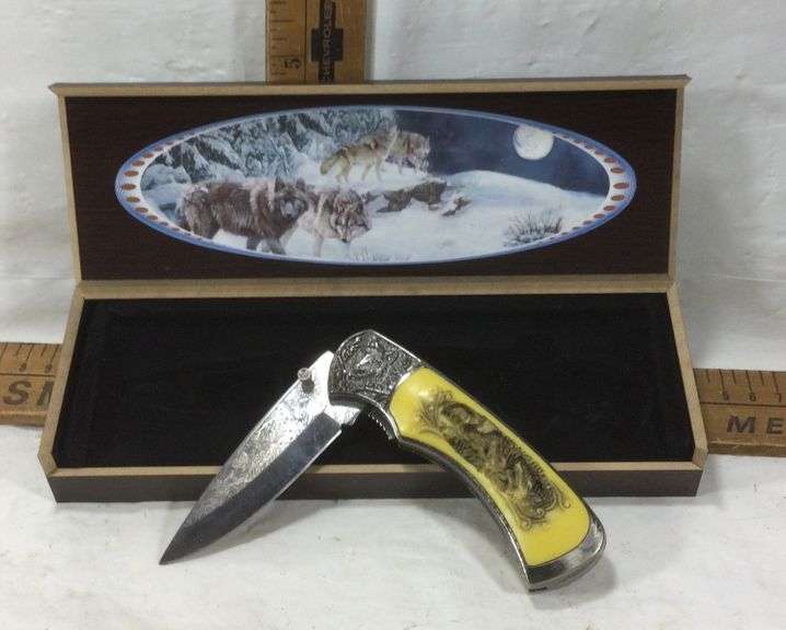 Collectible Engraved Wolf Folding Knife - Sherwood Auctions