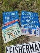 License Plates, Street Signs + Fun Sayings - Sherwood Auctions