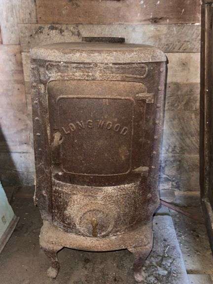 Longwood Cast Iron Wood Stove 3’ tall, top is 24”x17” - Sherwood Auctions