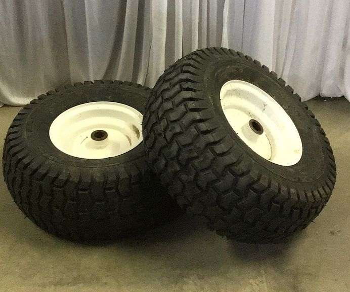 (2) Carlisle Turf-Saver 18x8.50-8NHS Tires and Wheels - Sherwood Auctions