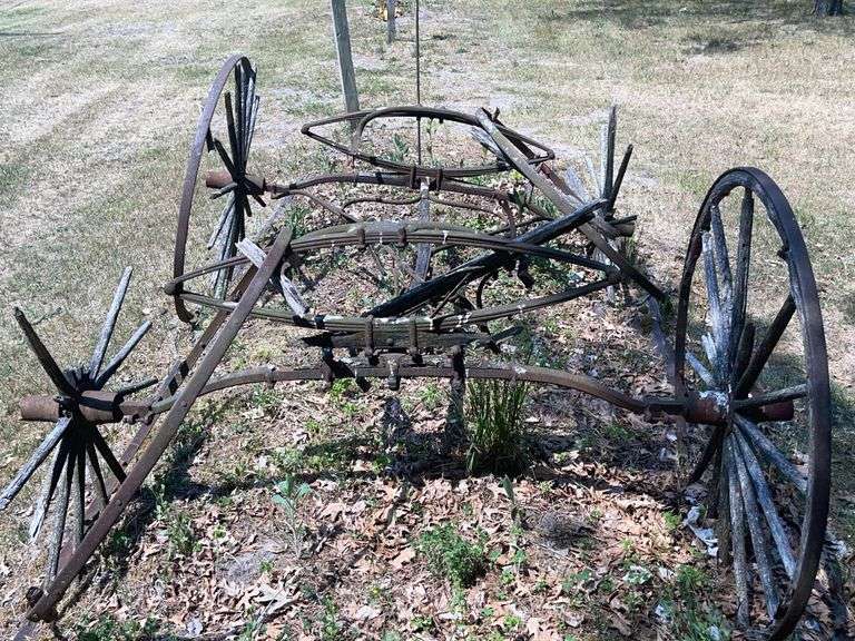 Yard Art Wagon Frame w/ Four Steel Wagon Wheel Frames - Sherwood Auctions