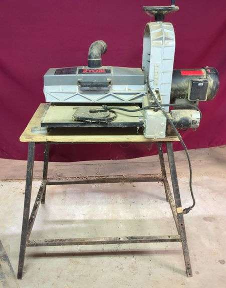Ryobi 10" Planer on Stand- has power - Sherwood Auctions