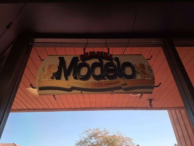 Modelo Sign - Sierra Auction Management Inc