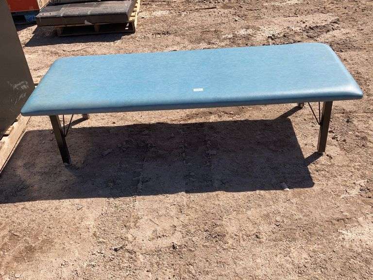 7 foot blue cushioned nurses bench. - Sierra Auction Management Inc