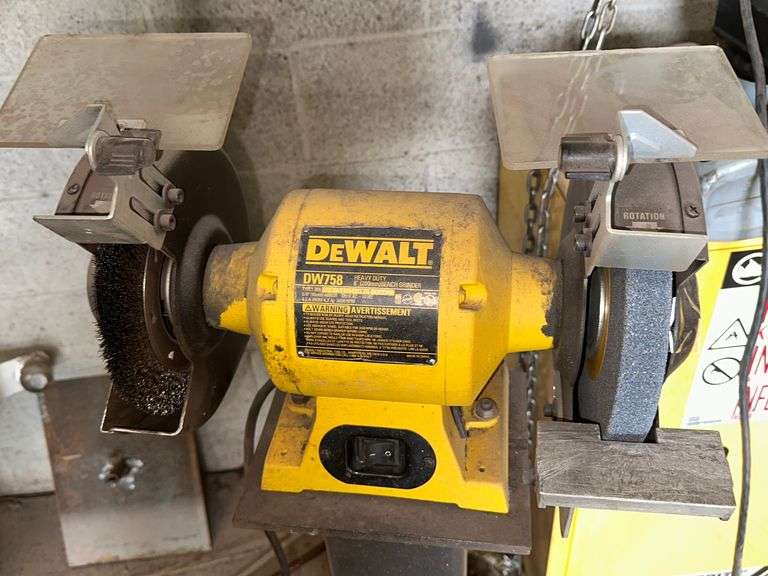 Dewalt Dw758 Heavy Duty 8 In Bench Grinder With A Metal Stand On Top Of ...