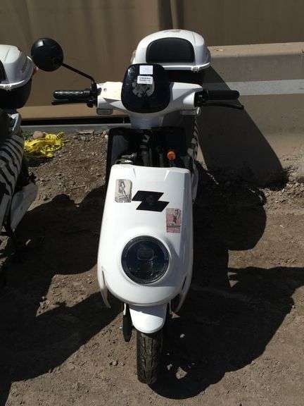 Zebra Now Electric Scooter - Sierra Auction Management Inc