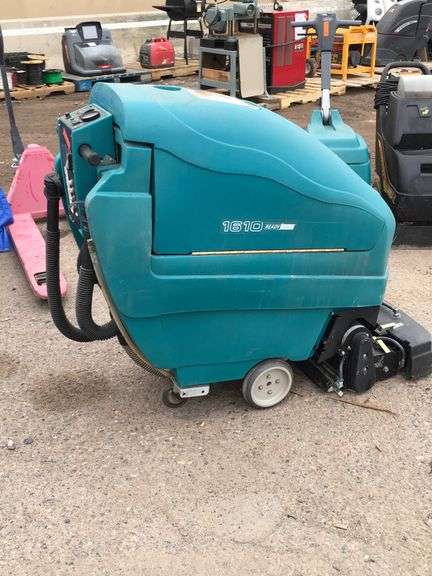Tennant 1610 Floor Scrubber - Sierra Auction Management Inc