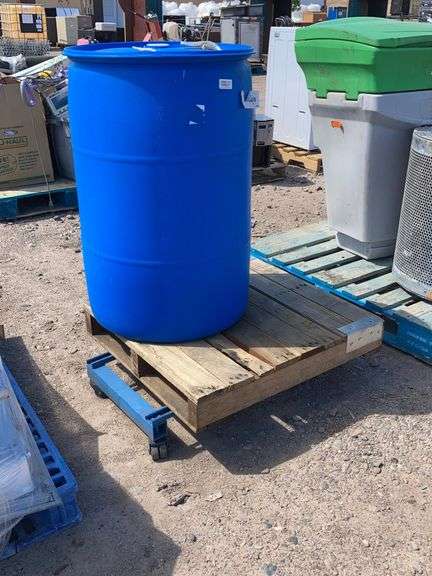 55 gallon blue plastic barrel with palette dolly. - Sierra Auction ...