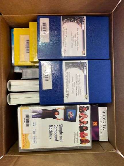 8 Boxes With VHS Tapes And DVD’s - Sierra Auction Management Inc
