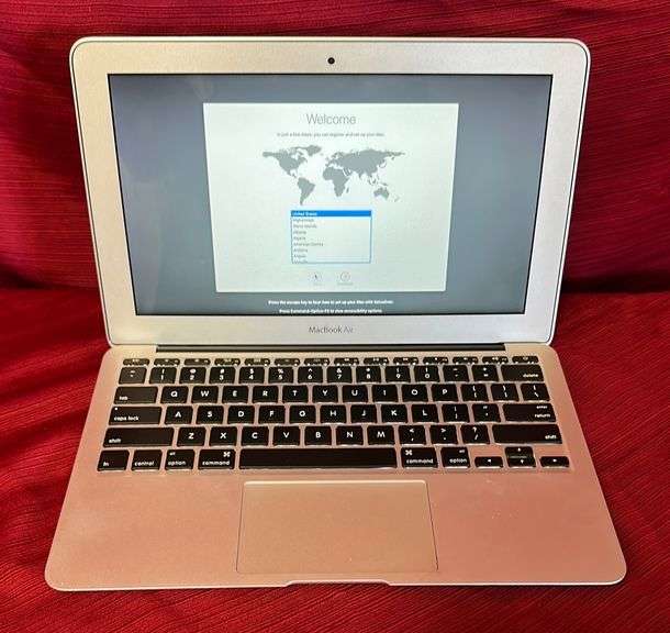 Apple MacBook Air Model : A1465 - Sierra Auction Management Inc