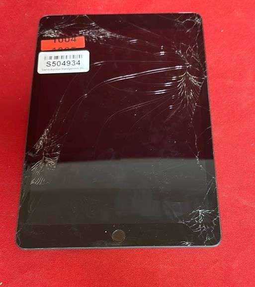 Apple iPad Model : A2200 (chipped screen) - Sierra Auction Management Inc