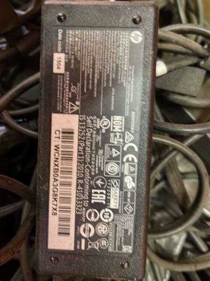 Box With HP Laptop Charging Cables - Sierra Auction Management Inc