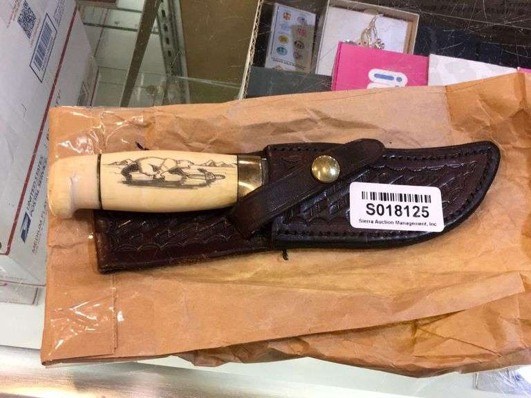 Ivory Handle knife - Sierra Auction Management Inc