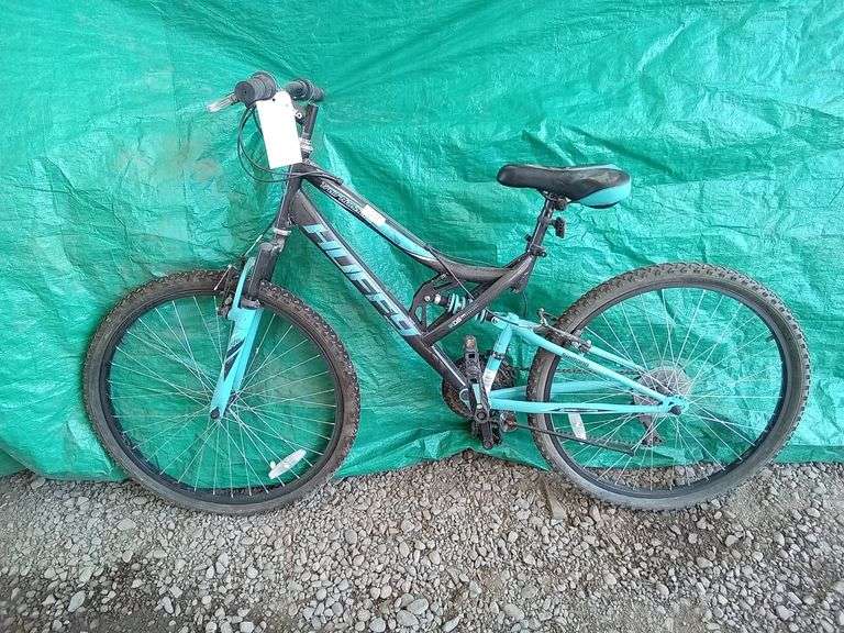 Black and Blue Huffy Mountain Bike - Sierra Auction Management Inc