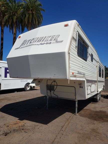 1993 Nu Wa Hitchhiker Travel Trailer - Sierra Auction Management Inc