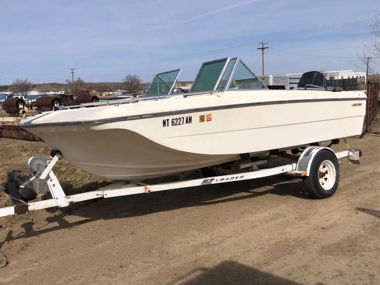 1973 Mark Twain Boat and trailer - Smith Sales Co. Auctioneers
