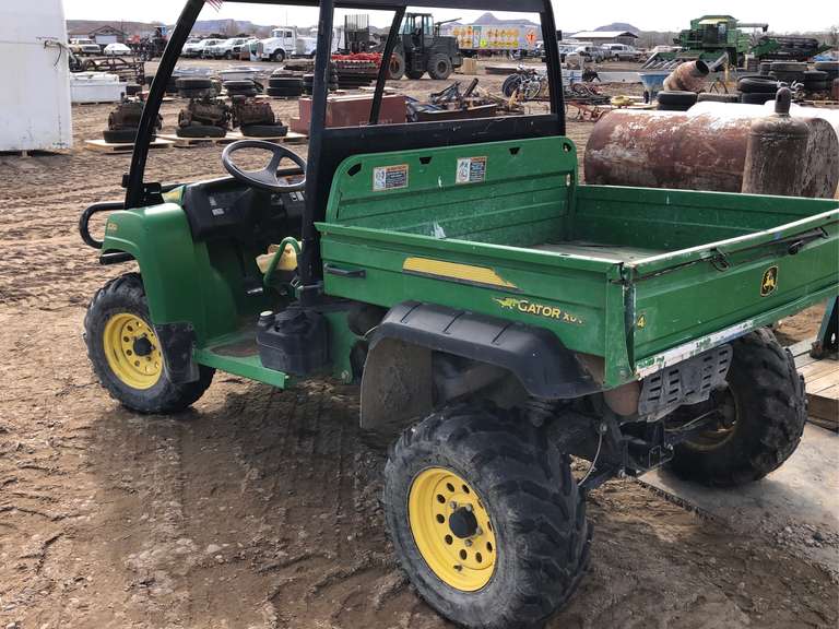 John Deere 620 Gator Side by Side - Smith Sales Co. Auctioneers